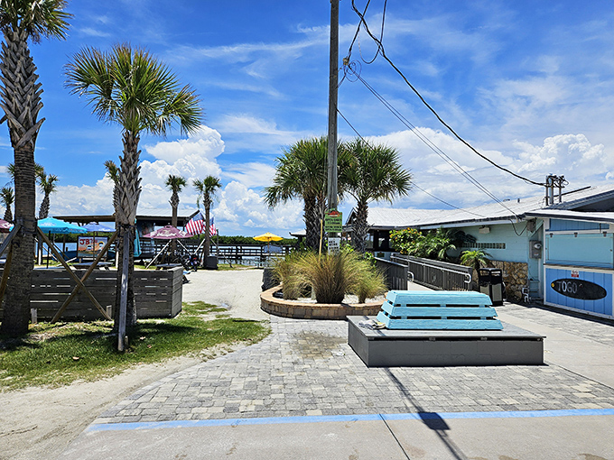 Palm trees, blue skies, and a sign pointing to seafood paradise. JB's Fish Camp is Florida in restaurant form.