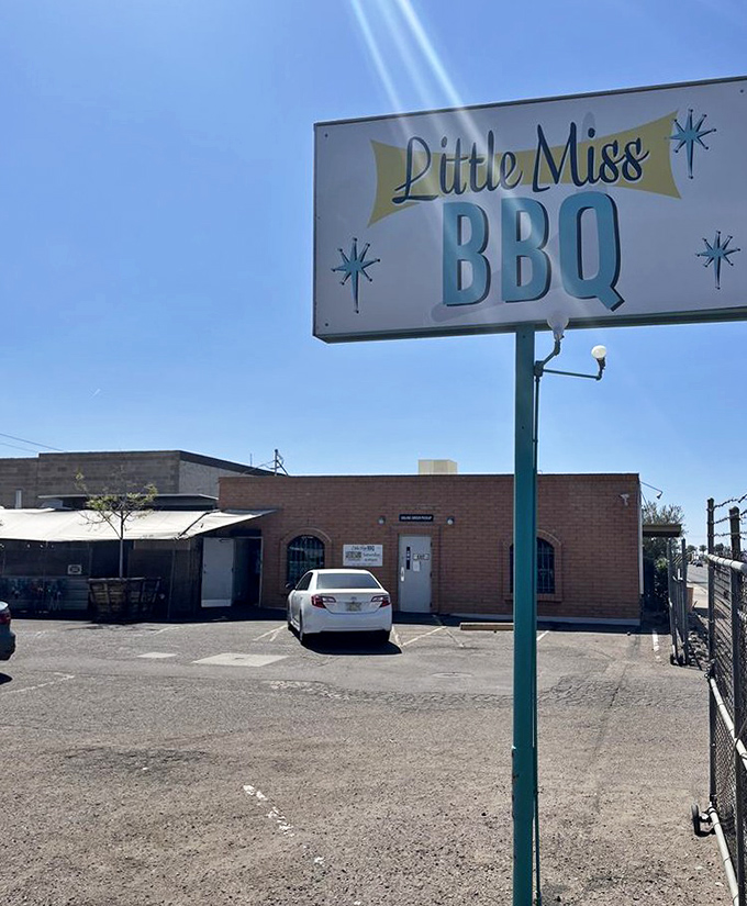 Arched windows frame the entrance to what locals consider their best-kept barbecue secret in town.