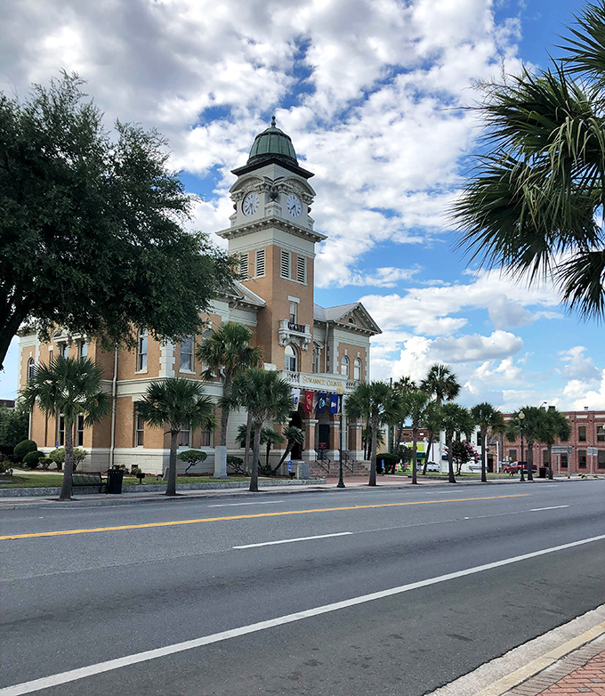 Live Oak's courthouse clock tower keeps time while palm trees sway to their own rhythm&mdash;Florida's version of "time is just a suggestion."