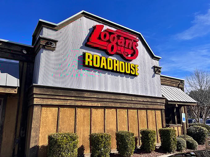 The rustic roadhouse exterior sets the stage for mesquite-grilled steaks and the kind of casual fun everyone needs.