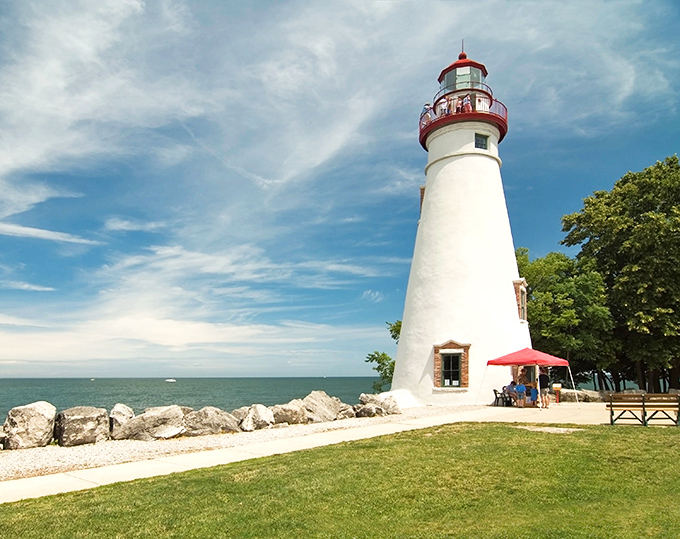 Marblehead Lighthouse stands tall against Lake Erie's horizon, its whitewashed tower a beacon for sailors and photographers alike.
