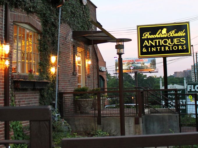 Evening glow transforms this brick beauty into an inviting beacon for after-hours antique adventures and discoveries.