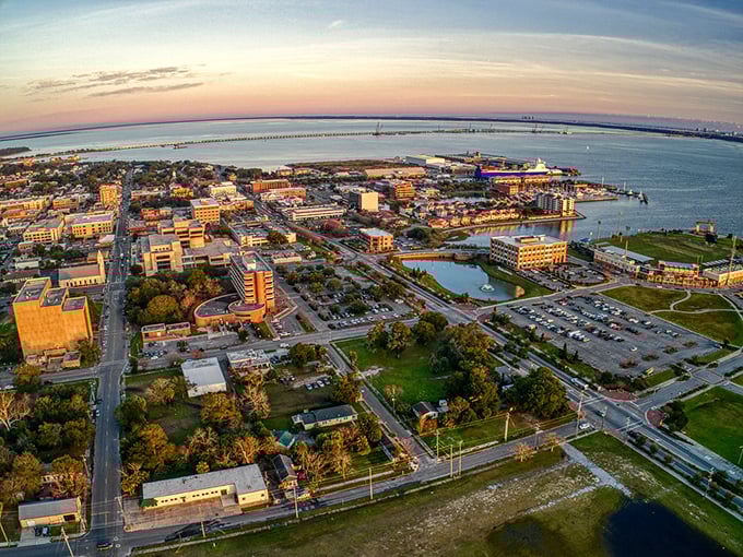 Pensacola's waterfront view stretches to forever, where palm trees frame a postcard you get to live in.