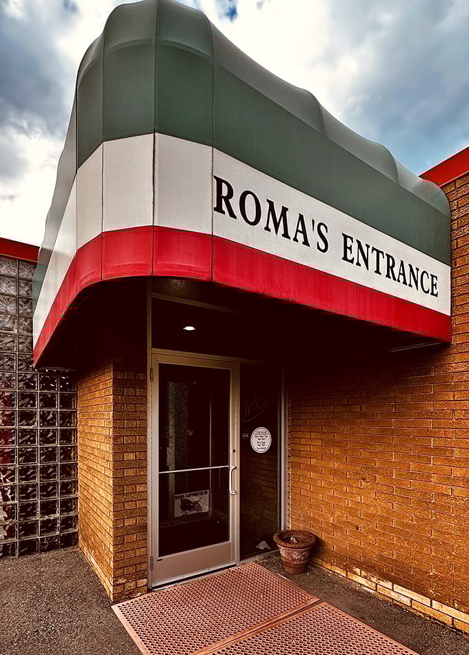 Roma's elegant entrance design elevates the pizza experience before you even taste their authentic Italian creations.