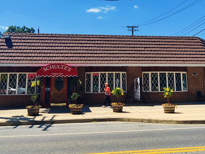 Brick, flowers, and diamond windows create the perfect setting for family crab feasts.