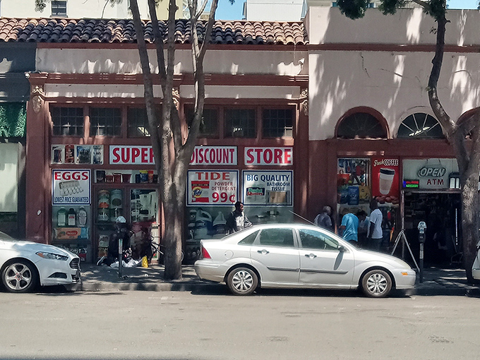 Super Discount Store's colorful window displays promise everything from eggs to bargains. The neighborhood's best-kept secret!