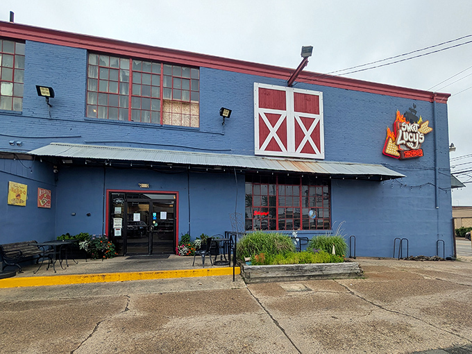 That blue barn exterior hints at the Southern comfort waiting inside this Philadelphia smokehouse.