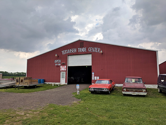Tecumseh Trade Center's classic red barn exterior promises authentic rural charm and genuine flea market treasures.