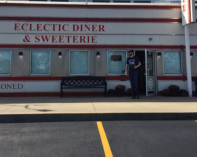 The Eclectic Diner's classic red and white exterior promises all the comfort of tradition with unexpected twists waiting inside.
