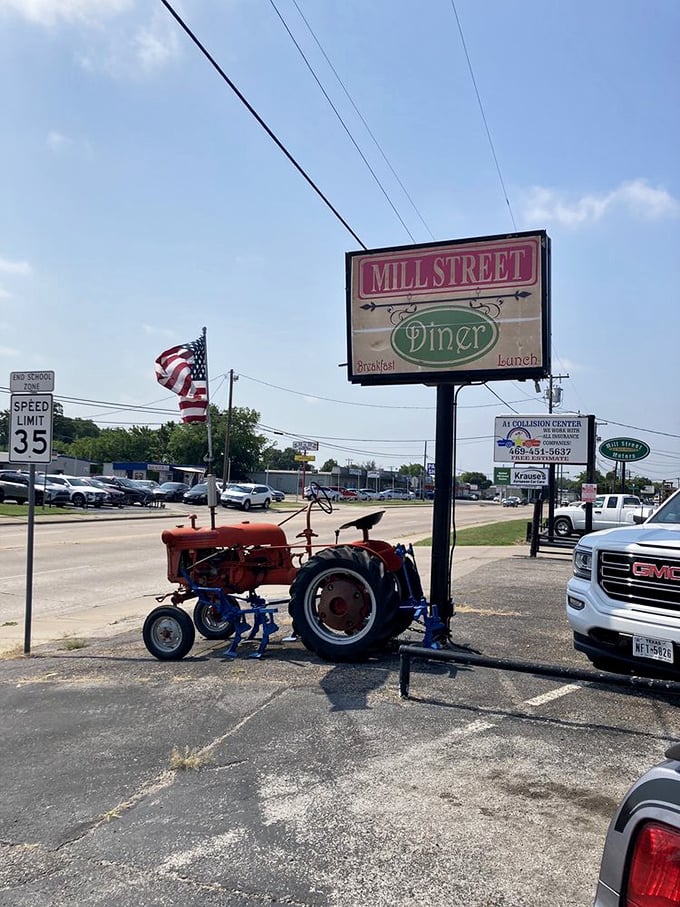 That vintage tractor isn't just decoration - it's a promise of down-home authenticity.