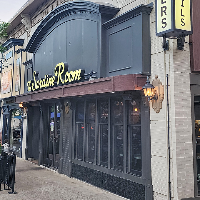 The Sardine Room's sophisticated gray facade with golden lettering is Plymouth's way of saying, "Yes, we do elegant seafood here."