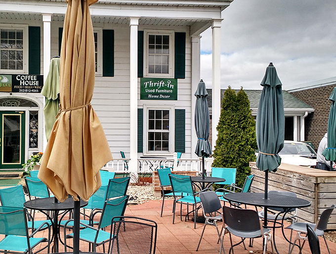 White building with green trim fits Lake Geneva's charm while hiding serious thrift store treasures.