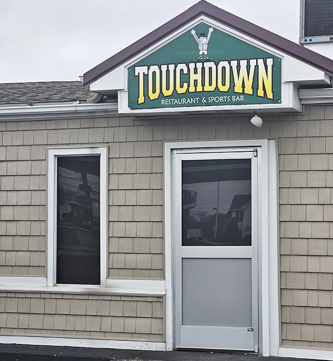 Touchdown's weathered exterior tells stories of countless game days fueled by seriously good fried chicken.