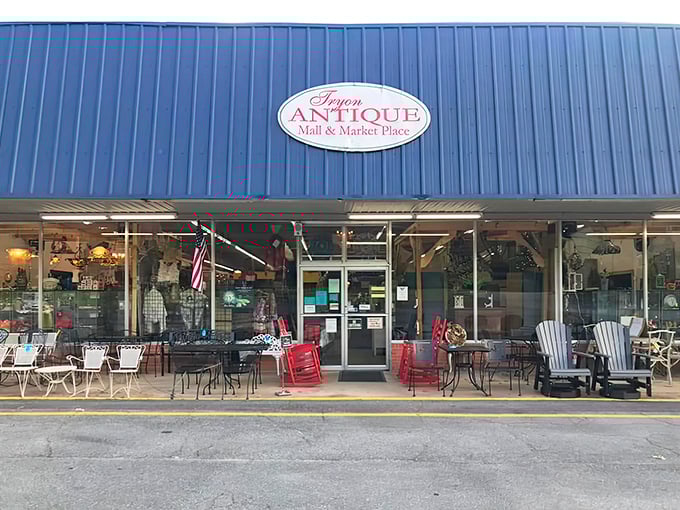 Tryon Antique Mall's blue roof shelters a world where yesterday's treasures become tomorrow's conversation pieces.