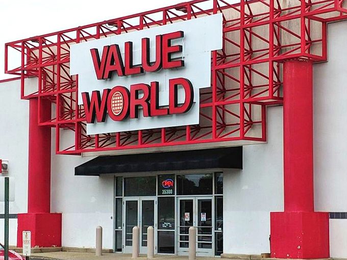 Value World's dramatic red entrance creates anticipation for the massive bargain adventure waiting inside.