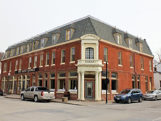 The Saint George hotel commands the corner like a distinguished gentleman who's seen every trend come and go.