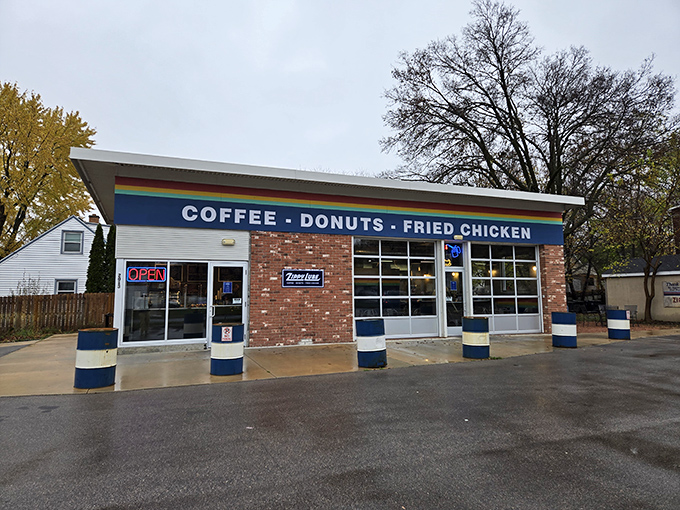 Zippy Lube's rainbow stripe promises a colorful approach to the unlikely trio of coffee, donuts, and fried chicken.