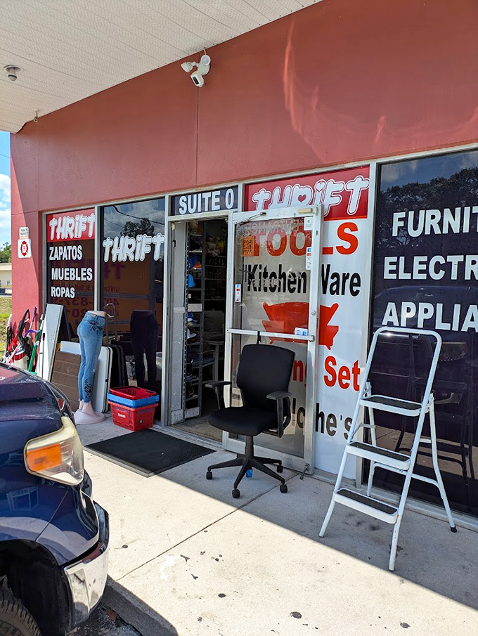 Tools, kitchenware, furniture, electronics - AZ Thrift's window display is like a yard sale with organization skills!