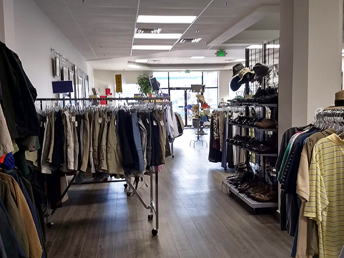 Inside, carefully arranged clothing and accessories create a boutique feel at thrift store prices.