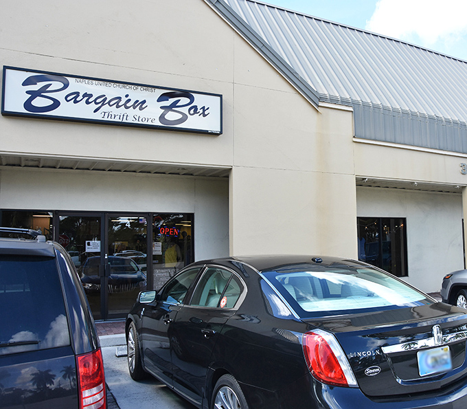 A closer look at Bargain Box shows luxury cars parked outside&mdash;a hint that donations here might include some high-end finds!