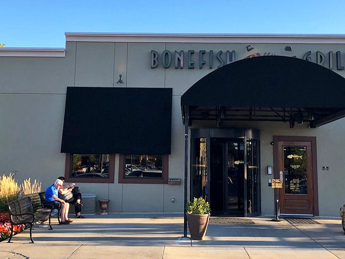 Those elegant planters and polished entrance promise an experience where every detail has been carefully considered.