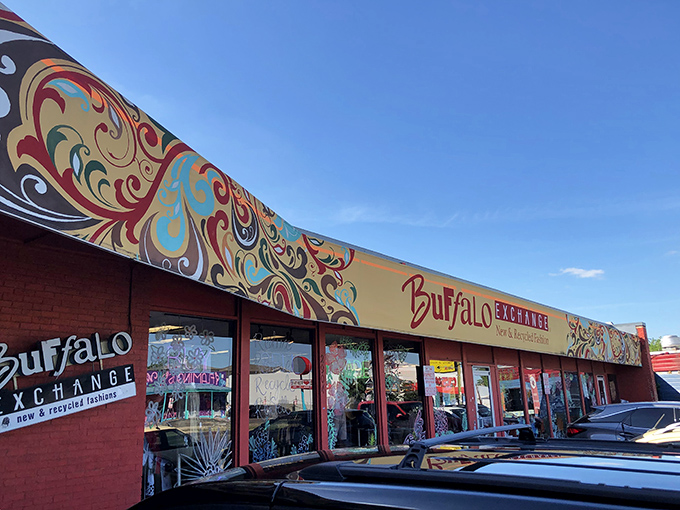 The swirling patterns above Buffalo Exchange promise a shopping experience that's anything but ordinary. Recycled fashion with flair!