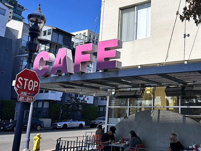 When a cafe chooses hot pink for its sign, you know they're confident about their pancake game.