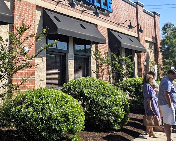 Modern lines and classic materials create the perfect backdrop for fresh catches prepared with contemporary coastal flair.