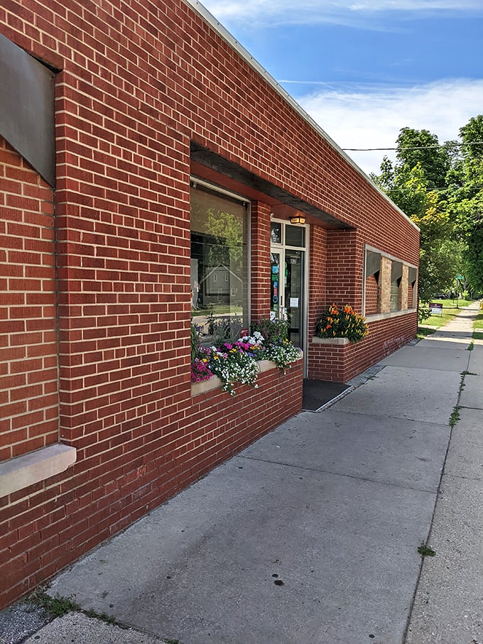 Flower boxes and brick walls create the perfect setting for Wisconsin's tavern-style pizza.