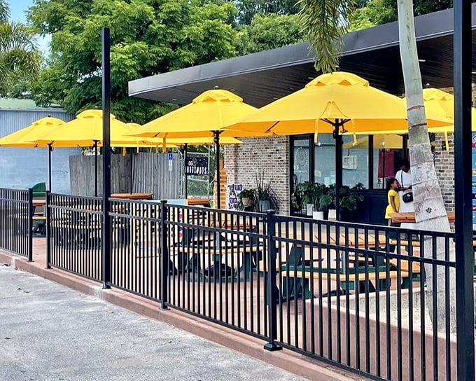 Those cheerful yellow umbrellas promise sunny dispositions and even sunnier glazed donuts beneath their shade.