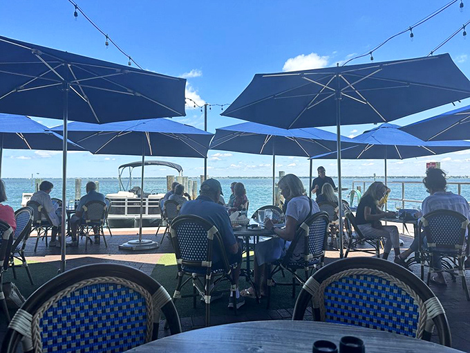 Those green umbrellas and string lights transform dinner into an event worth writing home about. 