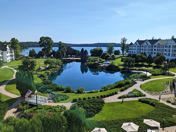 The Osthoff Resort gardens at Elkhart Lake create a peaceful oasis where water meets meticulously maintained greenery.