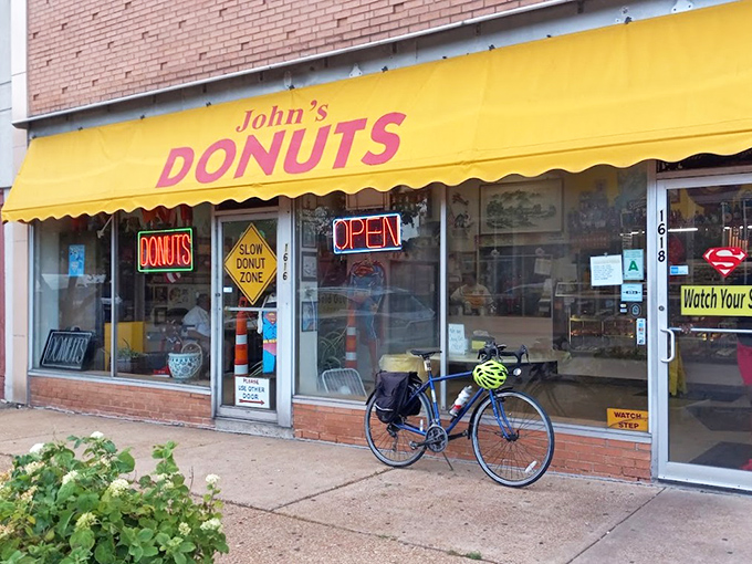 The "Slow Donut Zone" sign at John's is both a warning and a promise of the leisurely joy to come.