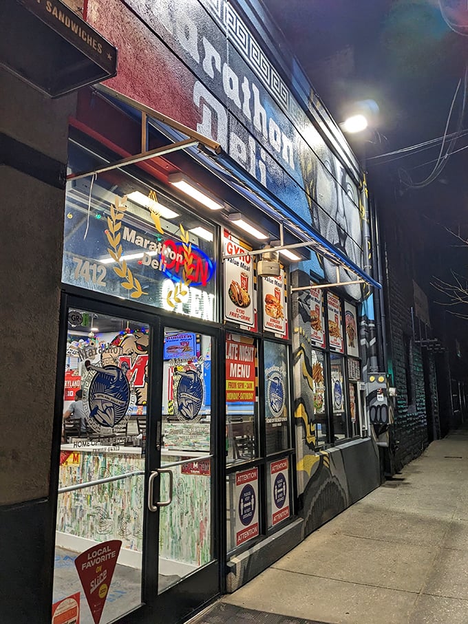 The colorful window displays at Marathon Deli tell a story of sandwich passion that spans decades. A College Park institution.