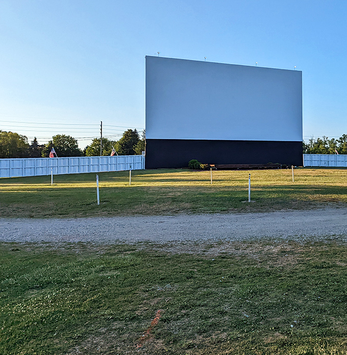 The towering screen stands ready to transform ordinary evenings into extraordinary movie adventures.