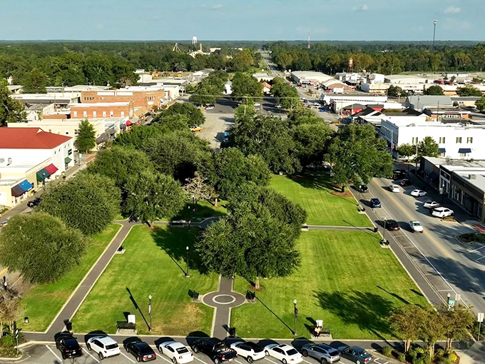 Classic storefronts line up like a welcoming committee for anyone seeking affordable Southern charm.
