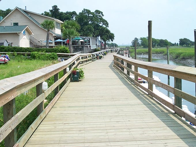 Waterfront boardwalks invite sunset strolls and peaceful moments watching boats drift by lazily.