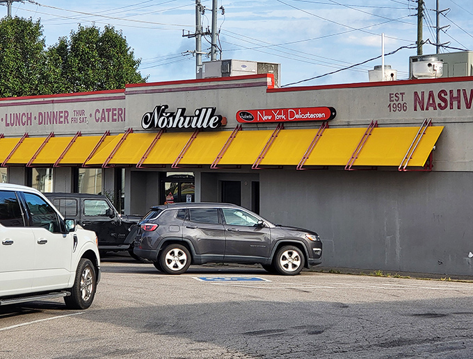 That retro storefront design whispers promises of matzo ball soup and pastrami that actually live up.
