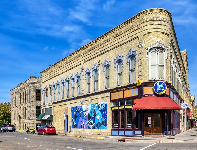 Oshkosh: Golden brick buildings glow in the sunshine along this budget-friendly main street. History without the heritage pricing!