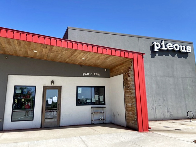 Concrete walls and red accents create the perfect backdrop for creative pizza combinations.