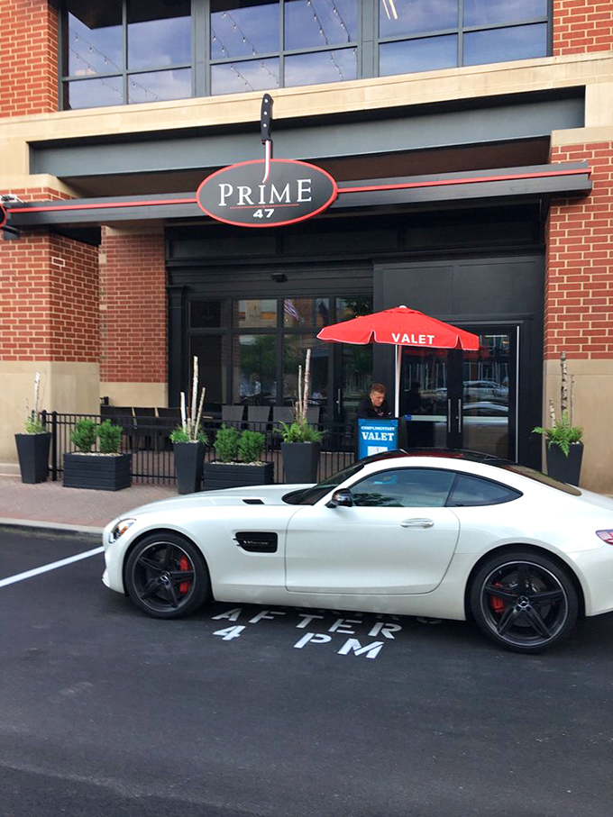That valet stand and sports car combo tells you everything about Prime 47's commitment to premium dining experiences.