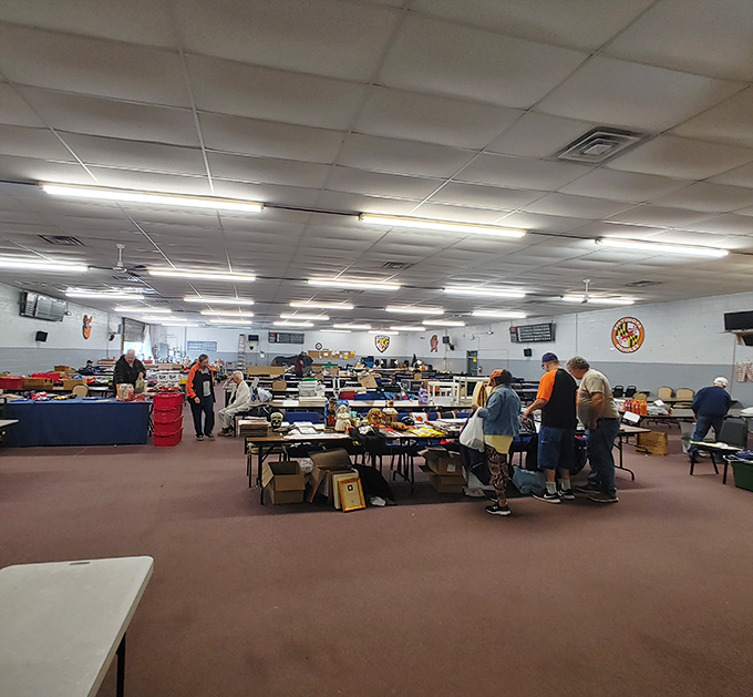 The humble exterior of these market sheds contains multitudes. Each table tells a different story through its carefully arranged items.
