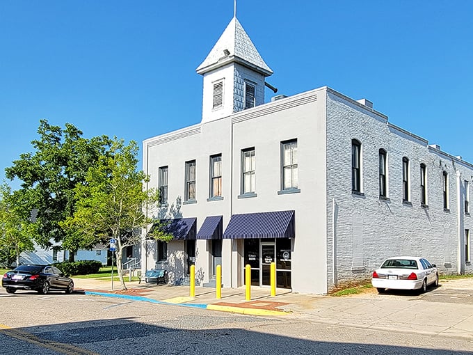 The pale blue historic building stands as a quiet sentinel in Quincy, where retirement savings go further than you'd expect.