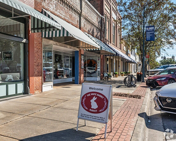 The White Rabbit Market sign beckons like Alice's adventure, but with better parking and probably fewer mad hatters.