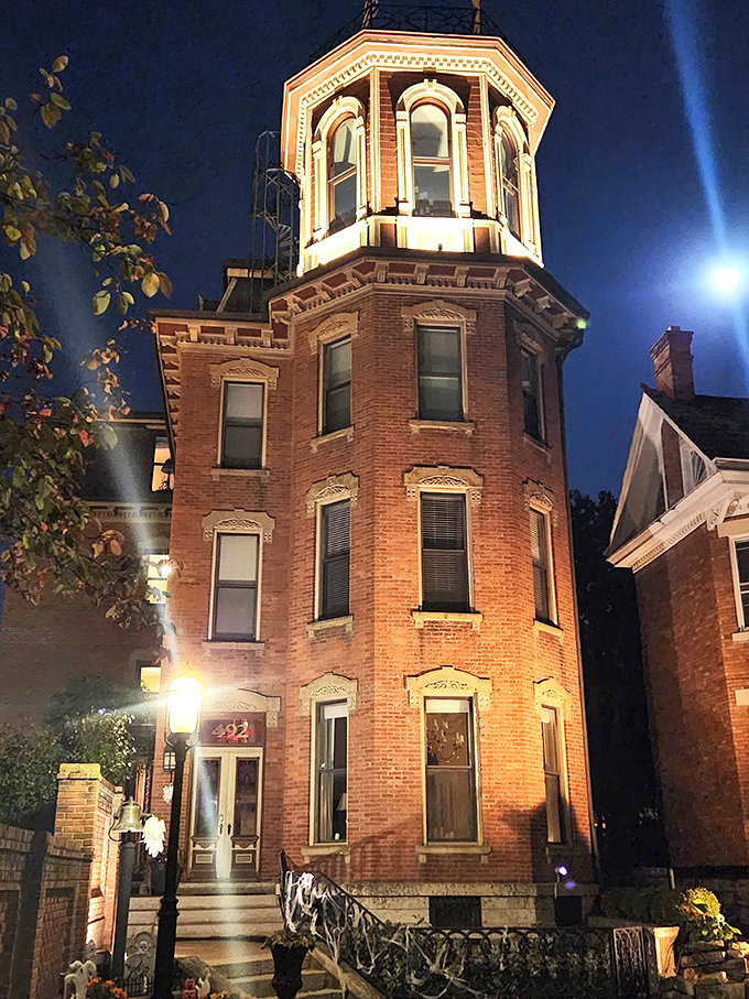 Schwartz Castle in Columbus glows against evening skies, where city castle dreams illuminate historic streets.