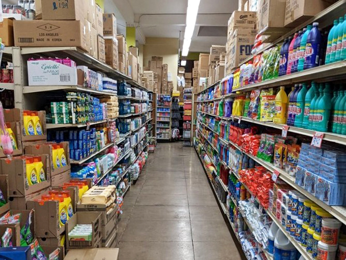Aisles packed with colorful products create a rainbow of savings. This is what discount heaven looks like!