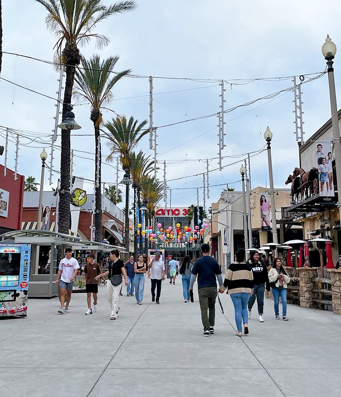 AMC theater sign promising rest for weary feet after hours of retail marathon training.