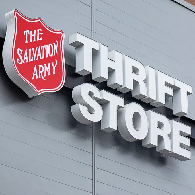 The Salvation Army's iconic shield logo stands proud, promising both bargains and community support with every purchase.