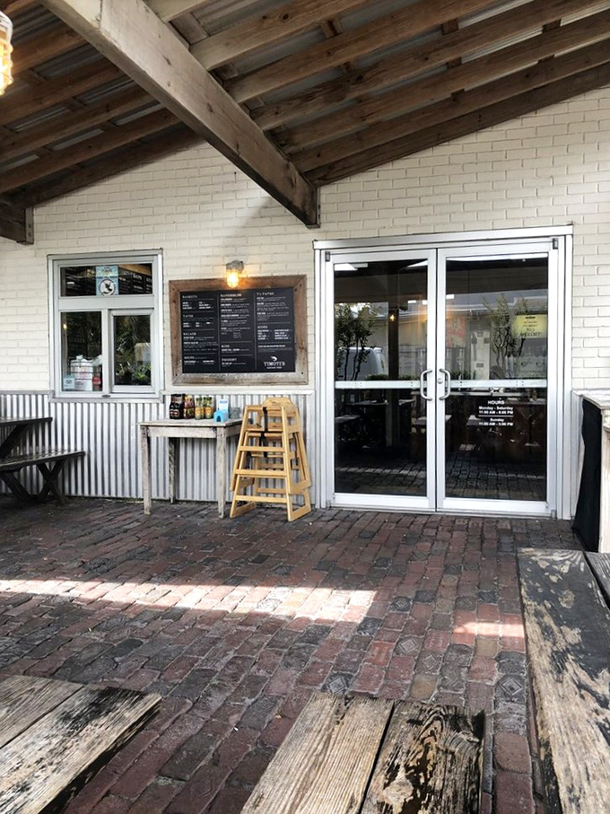 Brick pathways lead to seafood nirvana. Timoti's entrance feels like walking into a friend's stylish backyard barbecue.