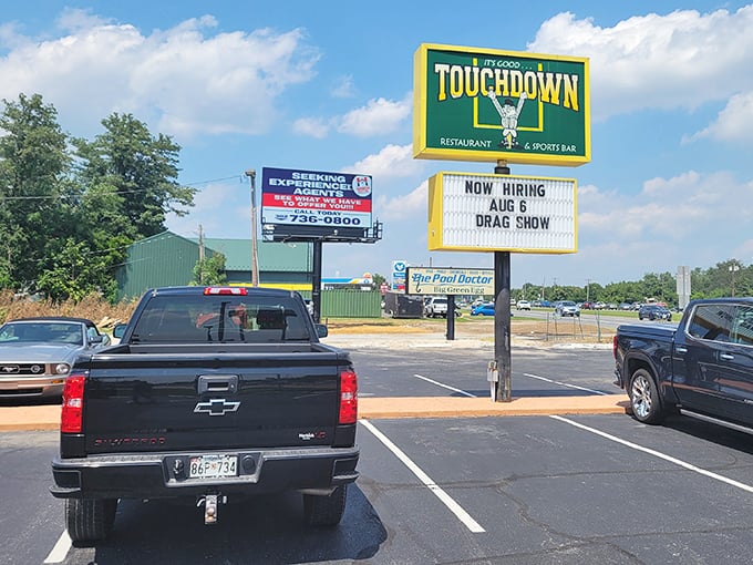 The yellow sign stands tall like a quarterback calling the perfect play for your taste buds.